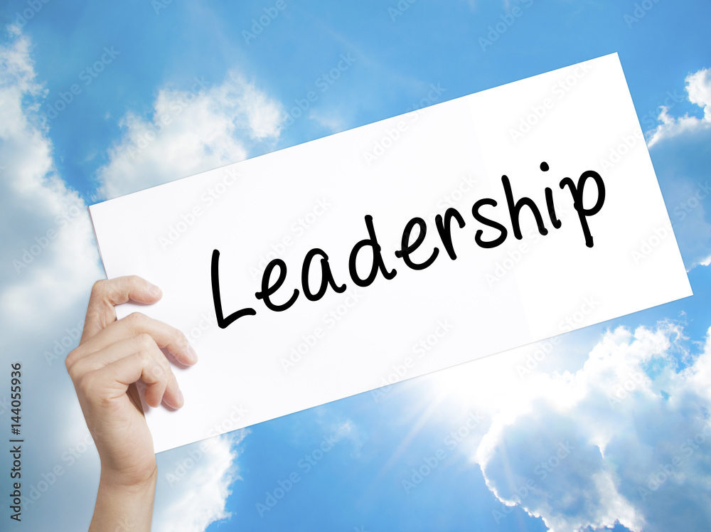 Leadership Sign on white paper. Man Hand Holding Paper with text ...