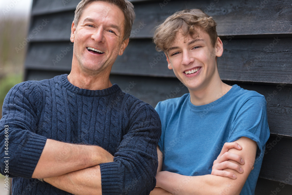 Happy Middle Aged Man Father and Teenage Son Arms Folded Stock Photo ...