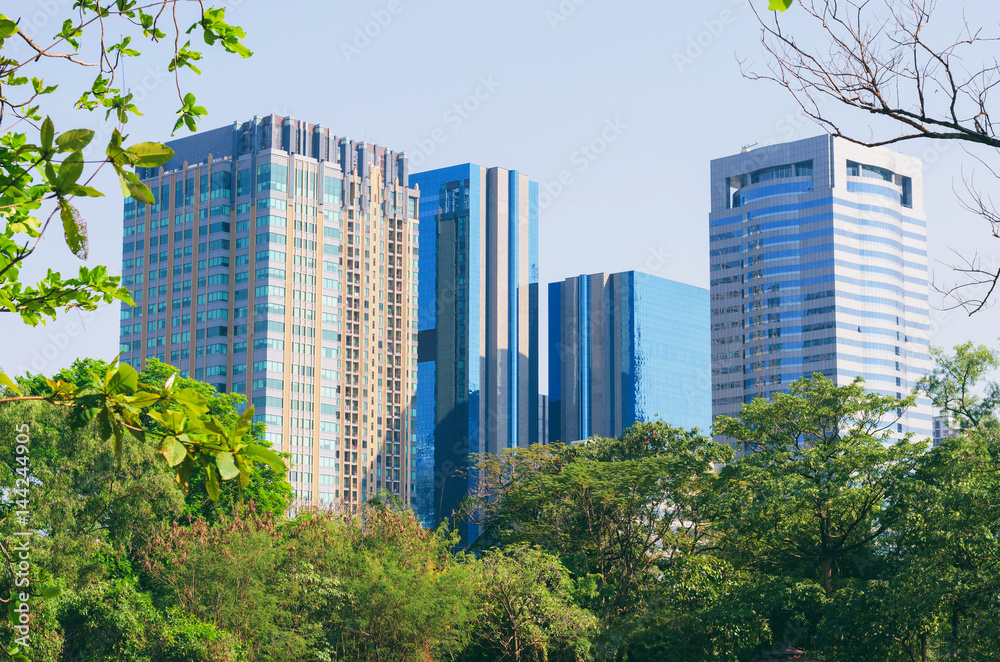 building with trees from park. green building, global warming concept ...