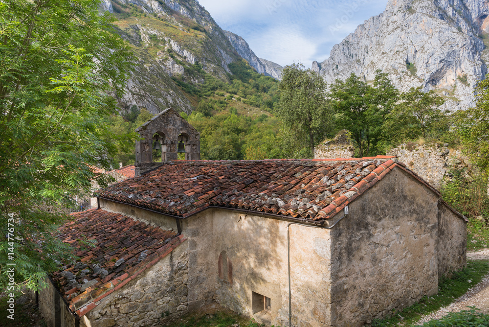 San Martín church in Bulnes in the Picos de Europa, one of the remotest ...