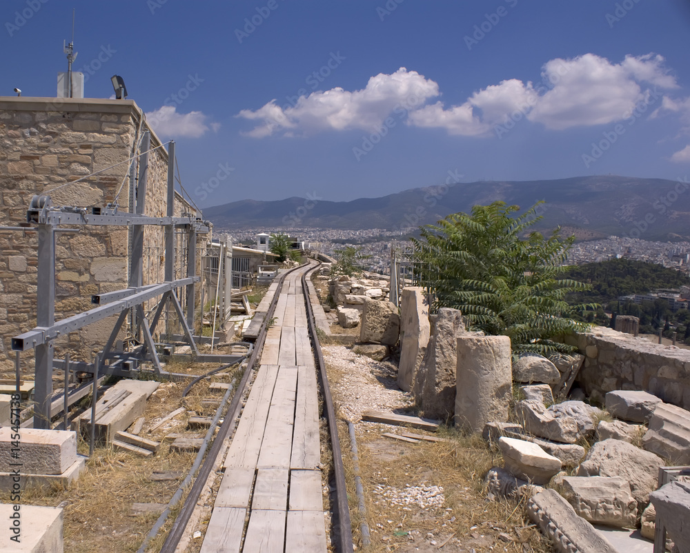 Trolley drives up the blocks to the Parthenon temple for the ...