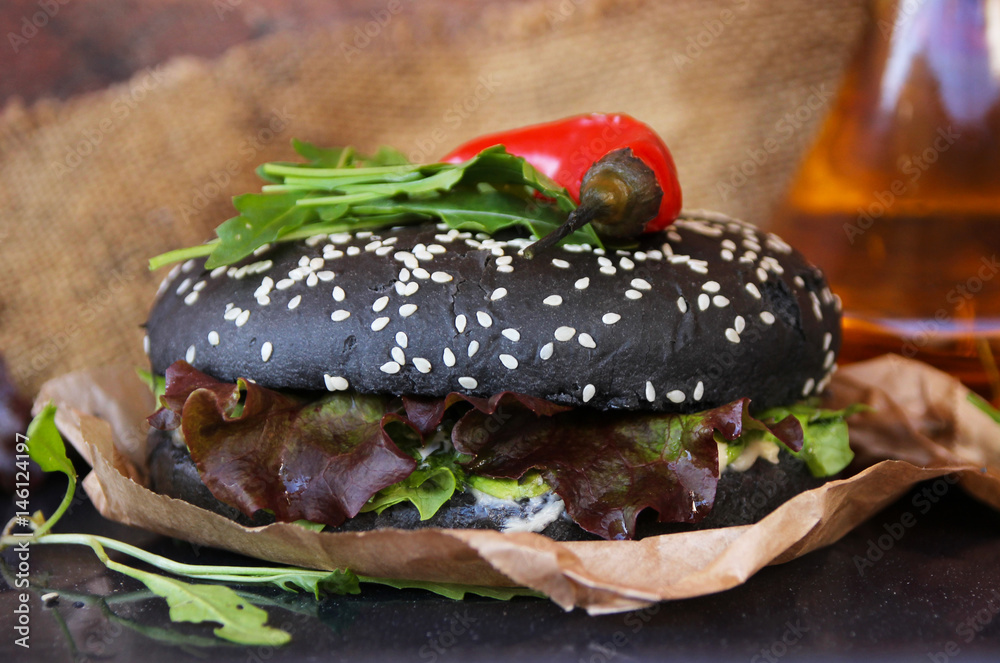 Black burger, fast food Stock Photo | Adobe Stock