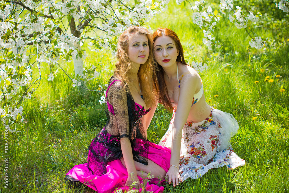 Two inspire beautiful girls with thin figure in oriental Arabian ...