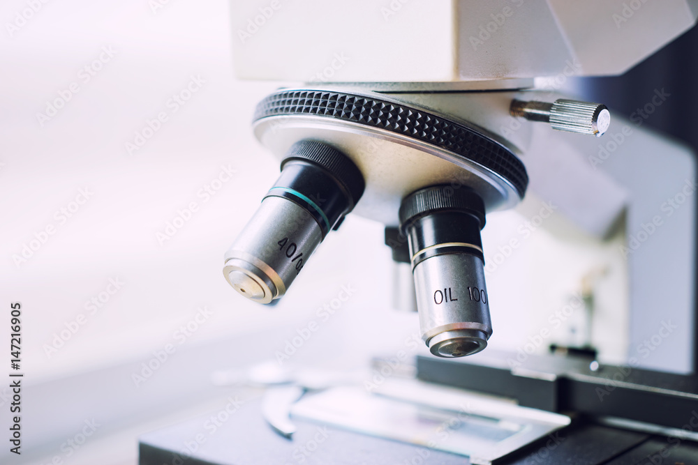 medical laboratory, scientist hands using microscope for chemistry test ...