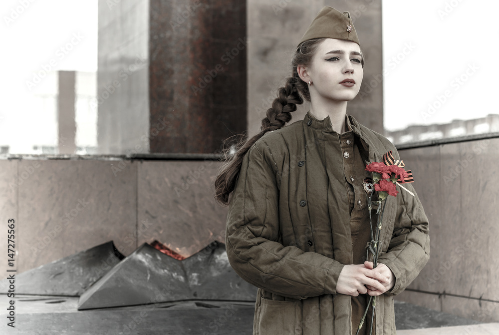 Girl in a Soviet military uniform Stock Photo | Adobe Stock