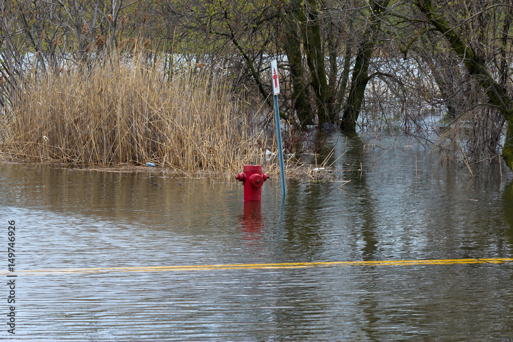 Fire hydrant flooded on a main street in St-Joseph du Lac, Quebec Stock ...