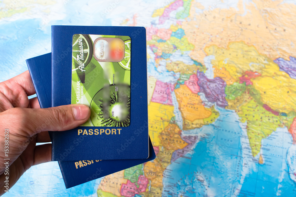 Blue passports on map background Stock Photo | Adobe Stock