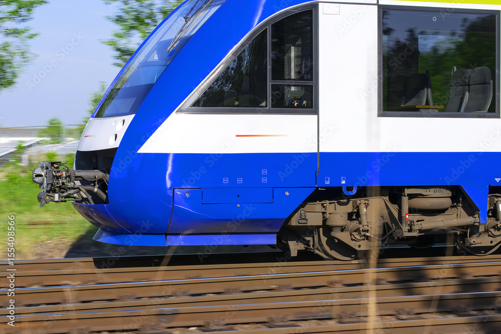 Beautiful express train, races by rail summer morning Stock Photo ...