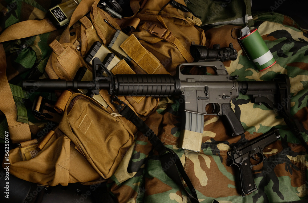 Assault rifle carbine with tactical chest rigs. Military Equipment ...