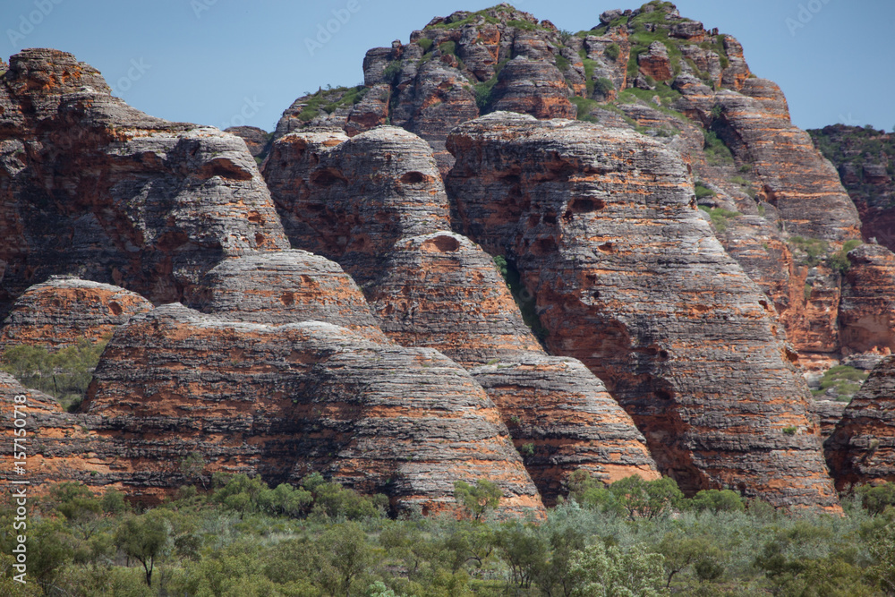 Afternoon shadows on outlier beehive domes in the Purnululu National ...