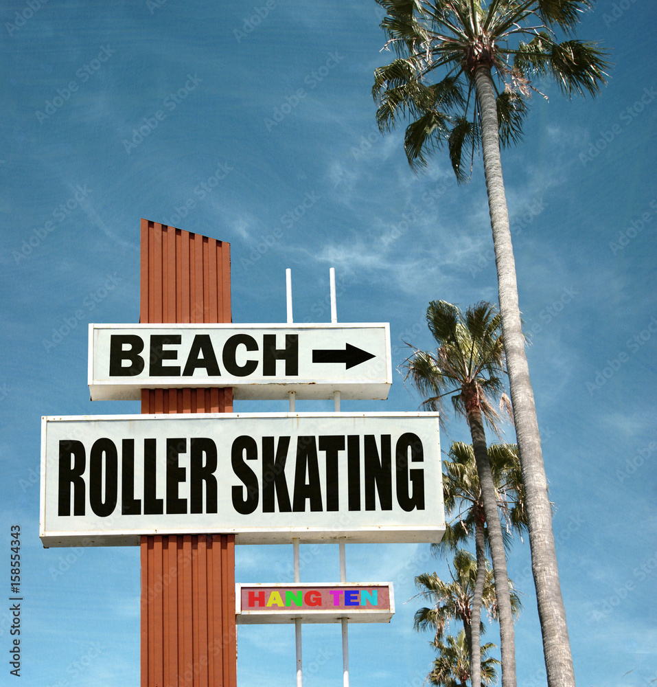 Foto de Stock aged and worn vintage photo of roller skating rink sign ...