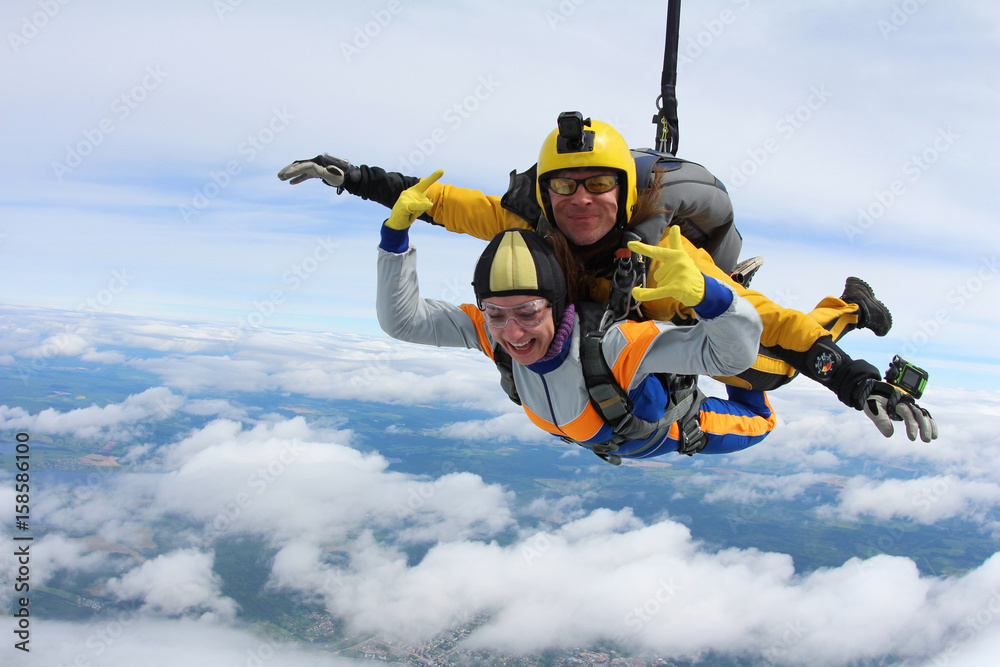 Tandem skydiving Stock Photo | Adobe Stock