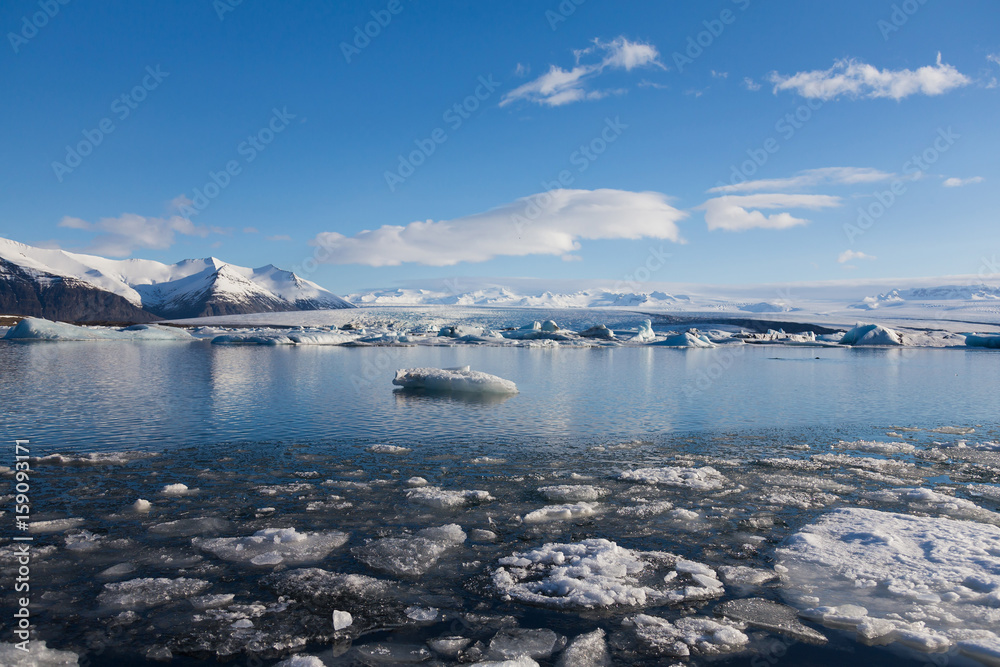 Jakulsarlon natural ice lagoon with clear blue sky background, natural landscape background ...