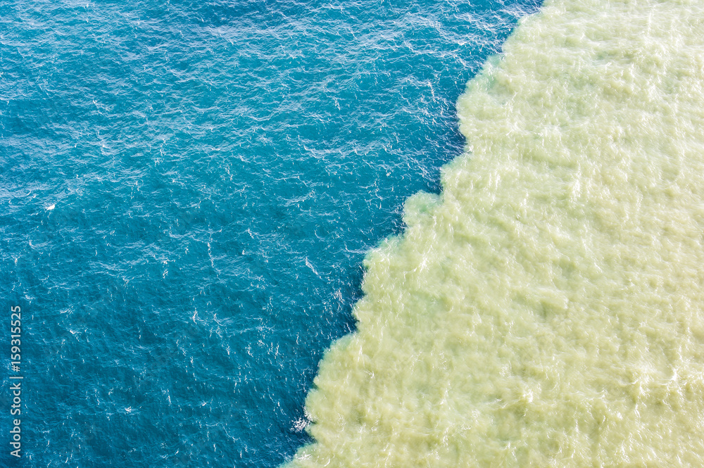 Freshwater mixing with salt water near estuary mouth Stock Photo ...