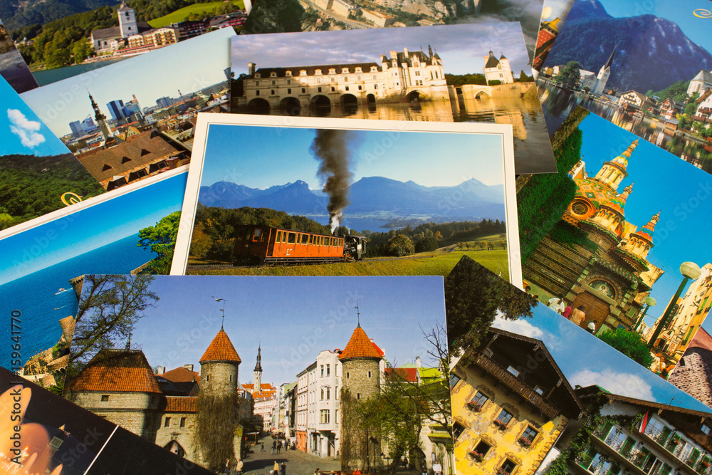 Postcards from different countries on the table Stock Photo | Adobe Stock