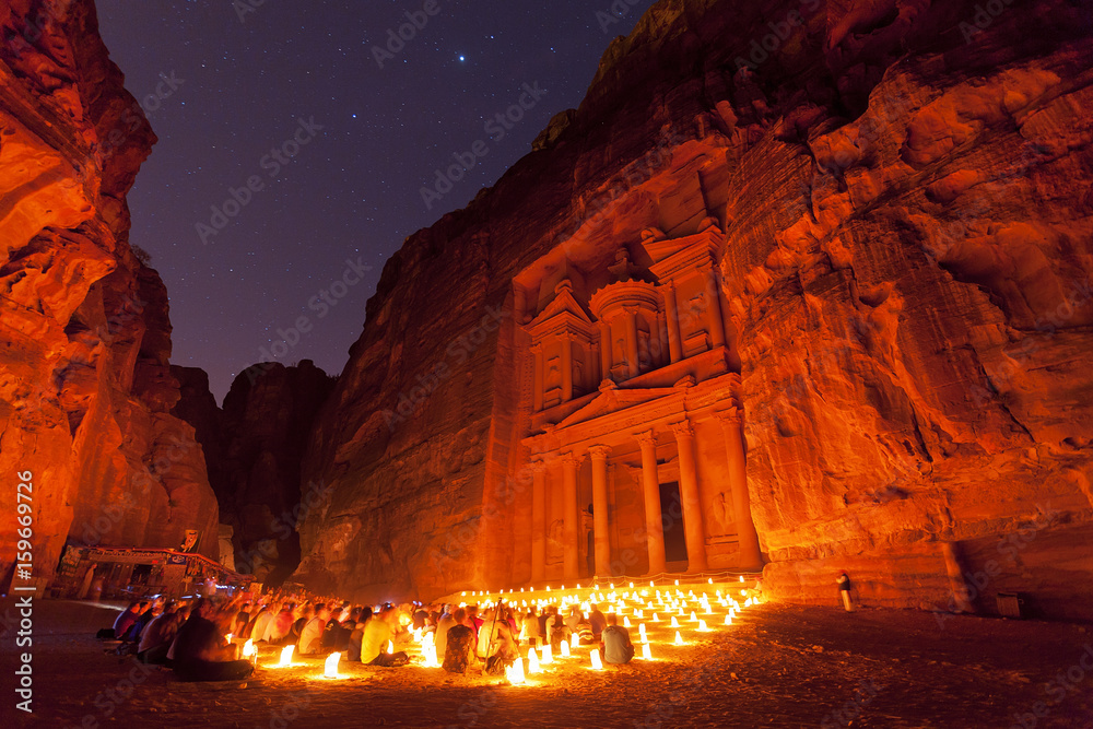 Petra by Night and sky full of stars Stock Photo | Adobe Stock