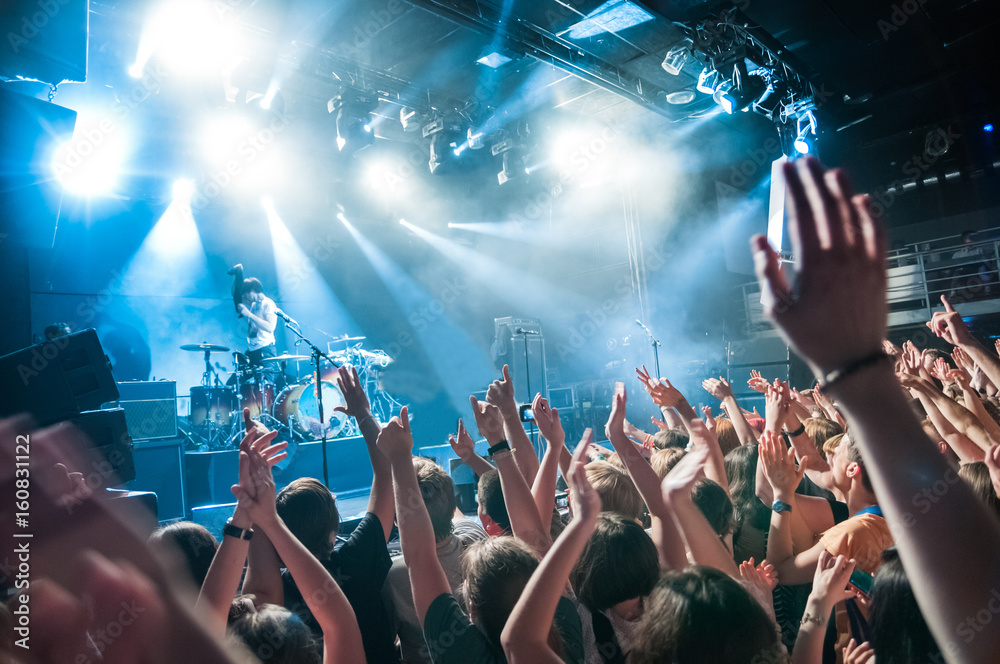 crowd with raised nands during concert at the concert club Stock Photo ...
