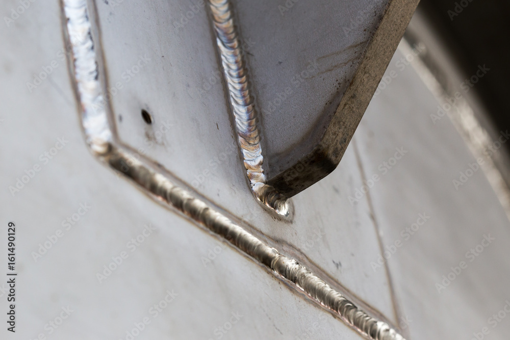 Stained steel plate with weld seam, industrial background texture Stock ...