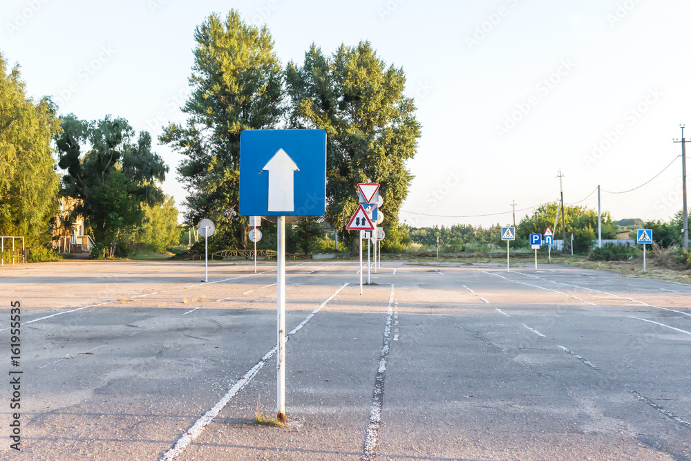 One-way traffic sign, various road signs, driving school training ...