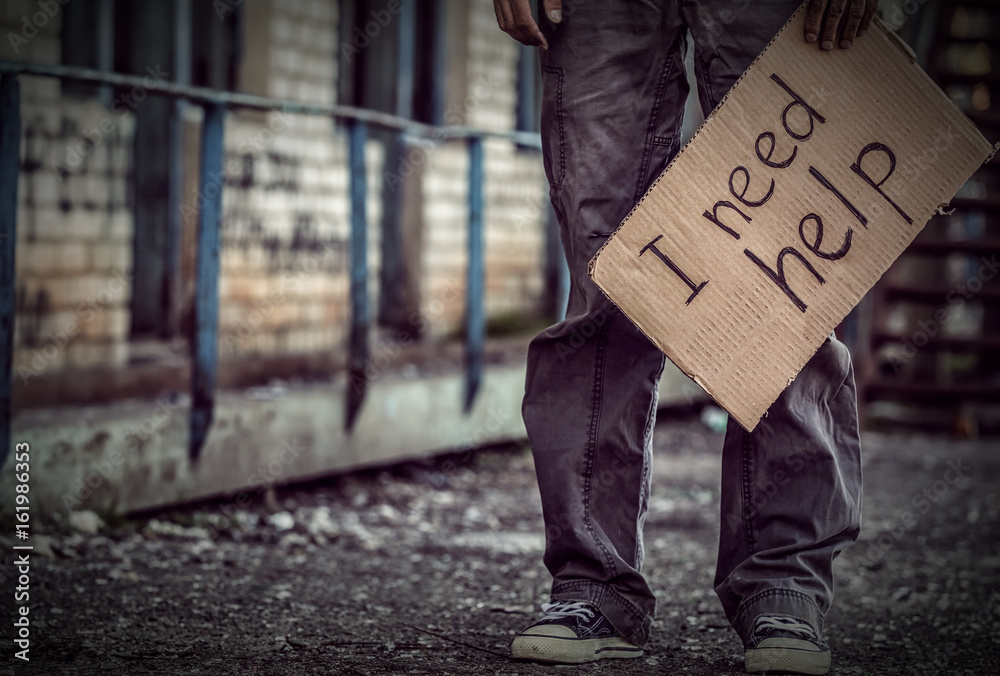 Poor man begging for help on the street Stock Photo | Adobe Stock