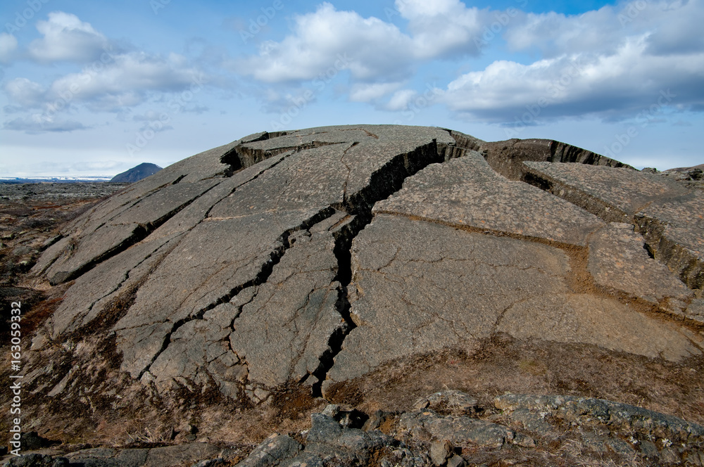 Foto de Stock Lava Bubble: A cracked dome of once molten rock emerges ...