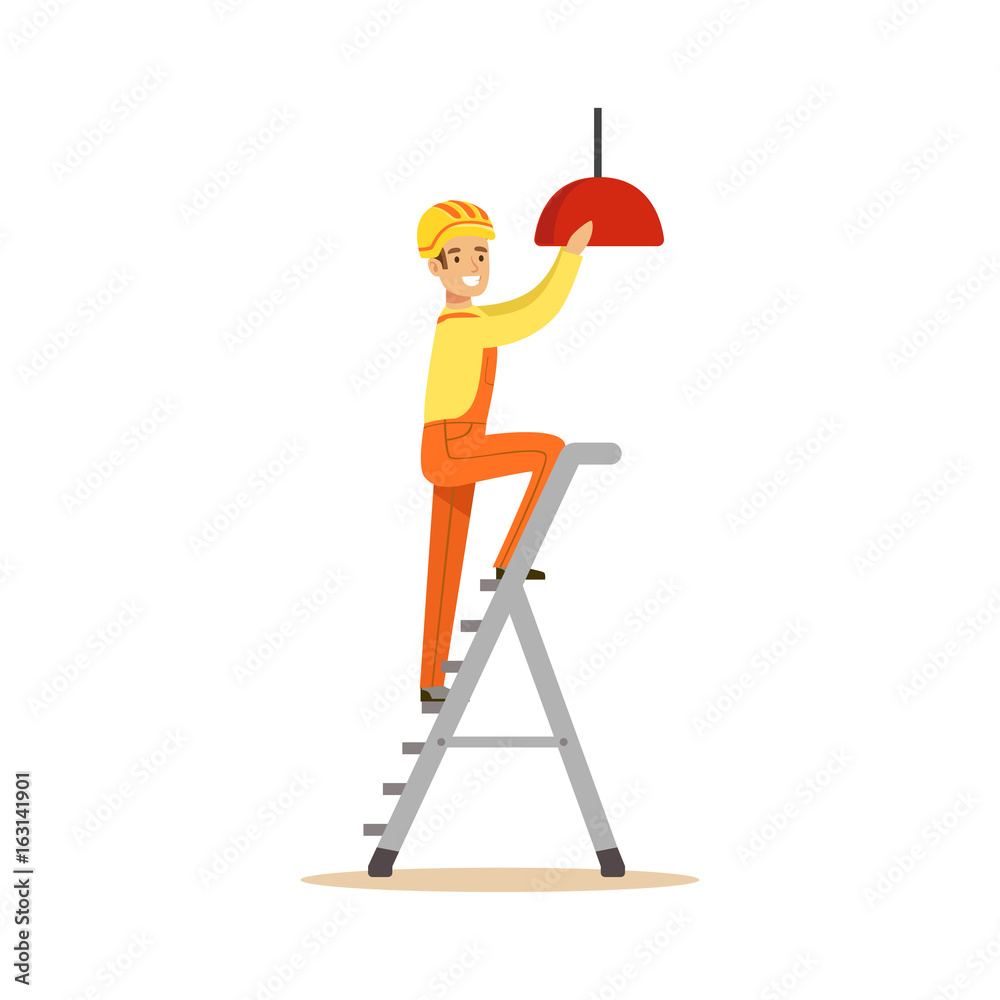 Electrician standing on a stepladder installing lighting on the ceiling ...