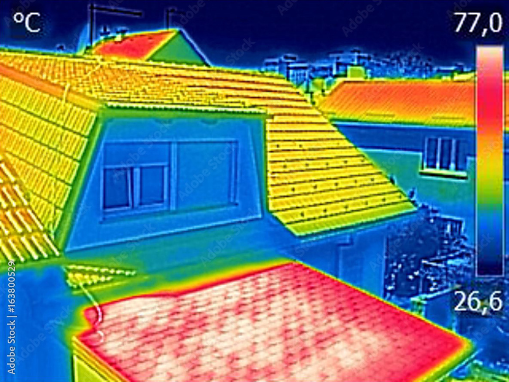 Infrared thermovision image showing Warmed roofs on family homes Stock ...