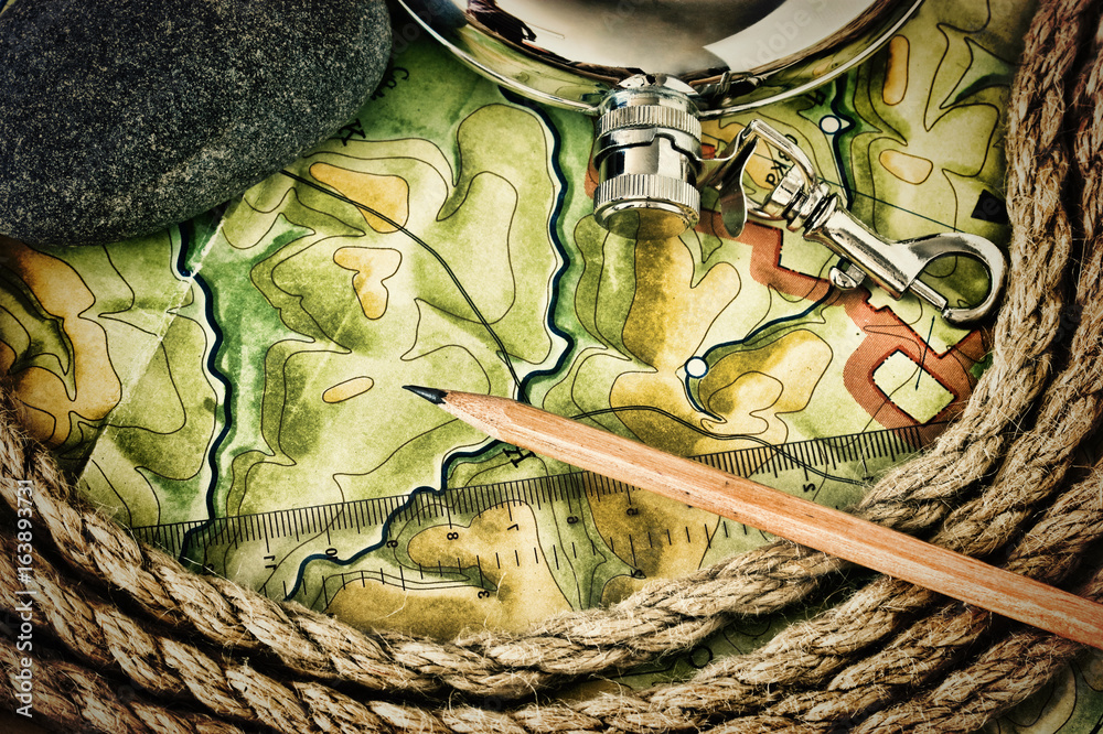 topographic maps and flask Stock Photo | Adobe Stock