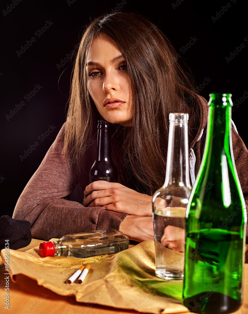 Foto Woman alcoholism is social problem. Female drinking is cause of ...