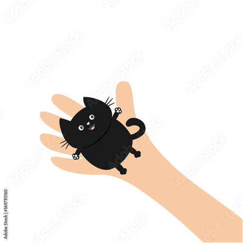 Hand arm holding black cat. Adopt animal pet. Helping hands concept ...