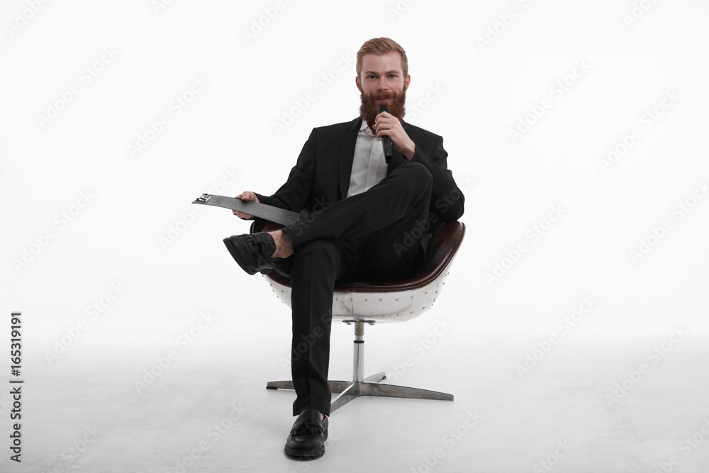 Live broadcasting. Portrait of confident young male professional news ...