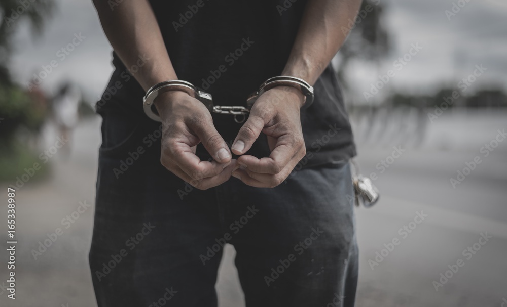 Vintage tone,man in handcuff on highway background concept crime ...