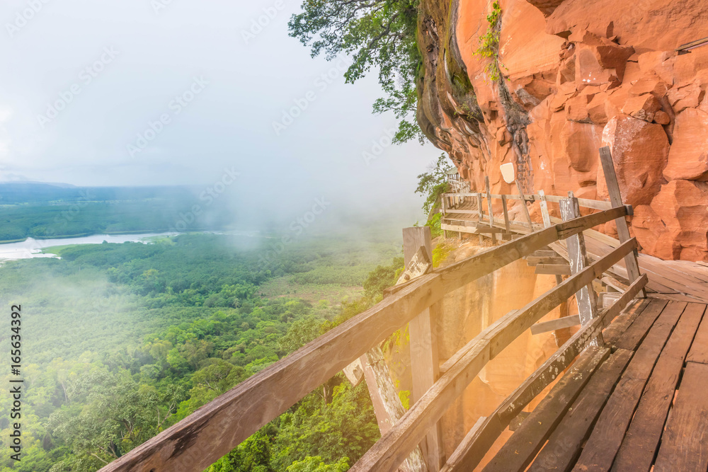 The soft focus of wooden bridge, balcony at mountain side, the women ...