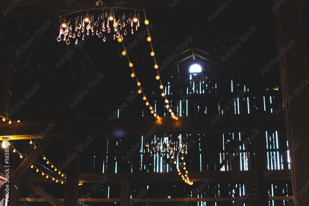 String of Lights in an Old Barn Stock Photo | Adobe Stock