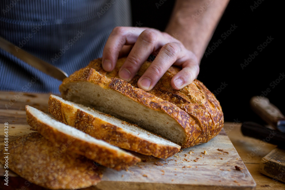 Slicing Bread Stock Photo | Adobe Stock