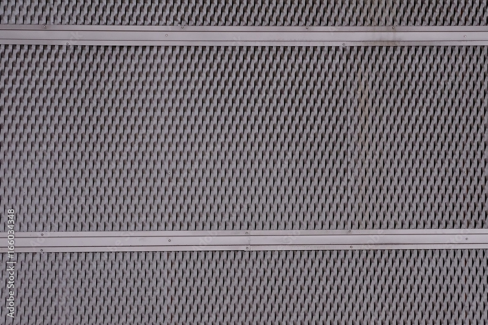 Foto iron metal sheet plate cladding with perforated holes in a ...