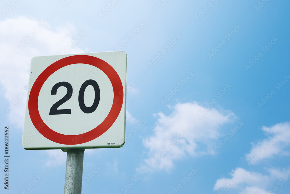 sign warned speed limit not over 20 Km/hr on blue sky background with ...