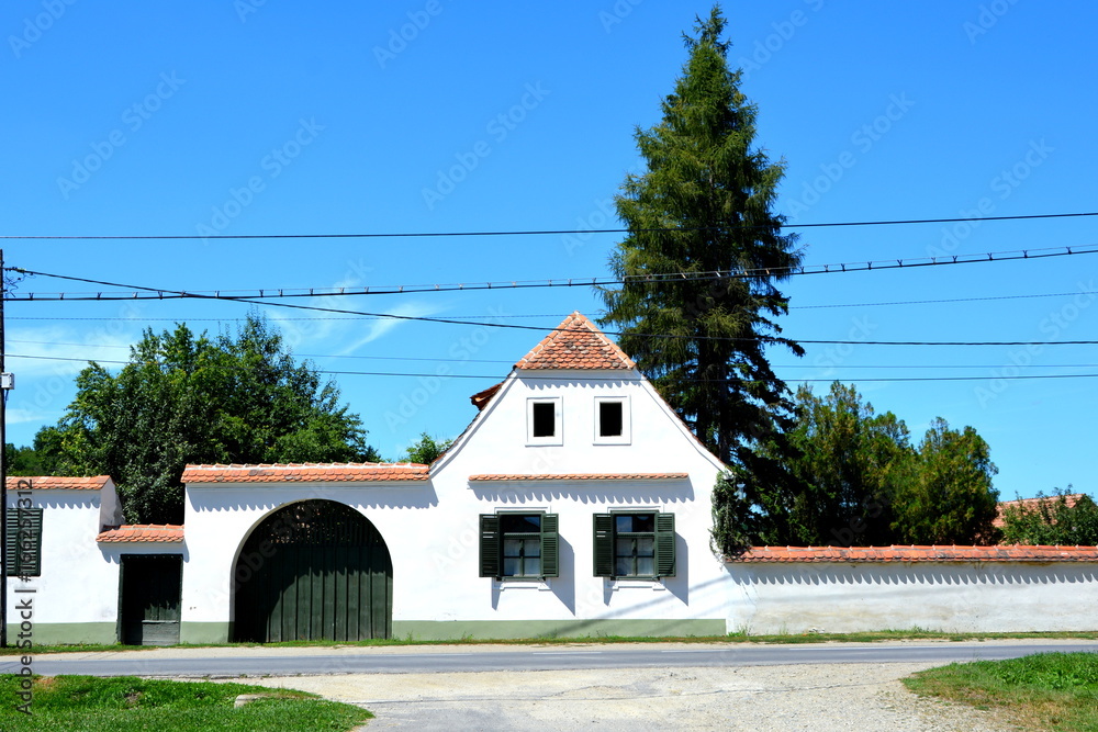 Typical rural landscape and peasant houses in Agnita- Agnetheln ...