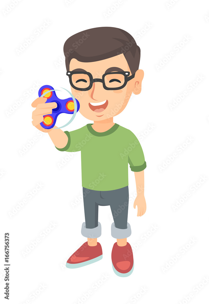 Caucasian little cheerful boy holding popular fidget spinner toy. Full ...