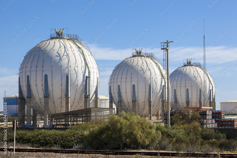 Spherical gas tanks at refinery Stock Photo | Adobe Stock