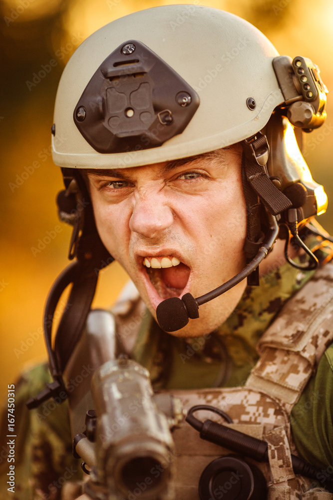 soldier yelling and pointing a rifle at the camera Bad emotion face ...