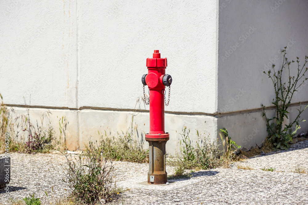 Old red fire hydrant in the street. Fire hidrant for emergency fire ...