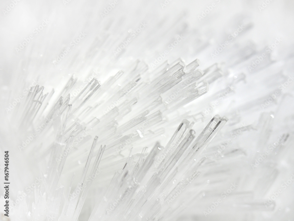 White mineral crystals cluster. Macro image of Quartz needle crystal ...