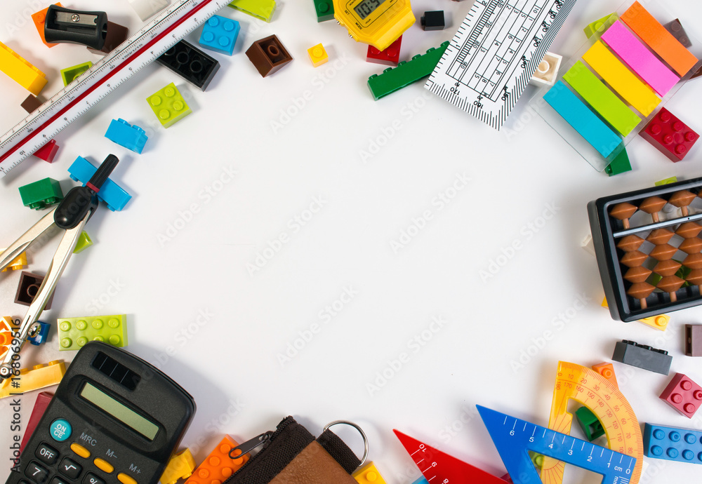 Frame of plastic toy blocks with mathematics tools and equipment ...