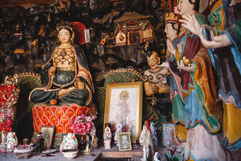 Altar in a Chinese Buddhist temple, colorfoul statues and deities and ...