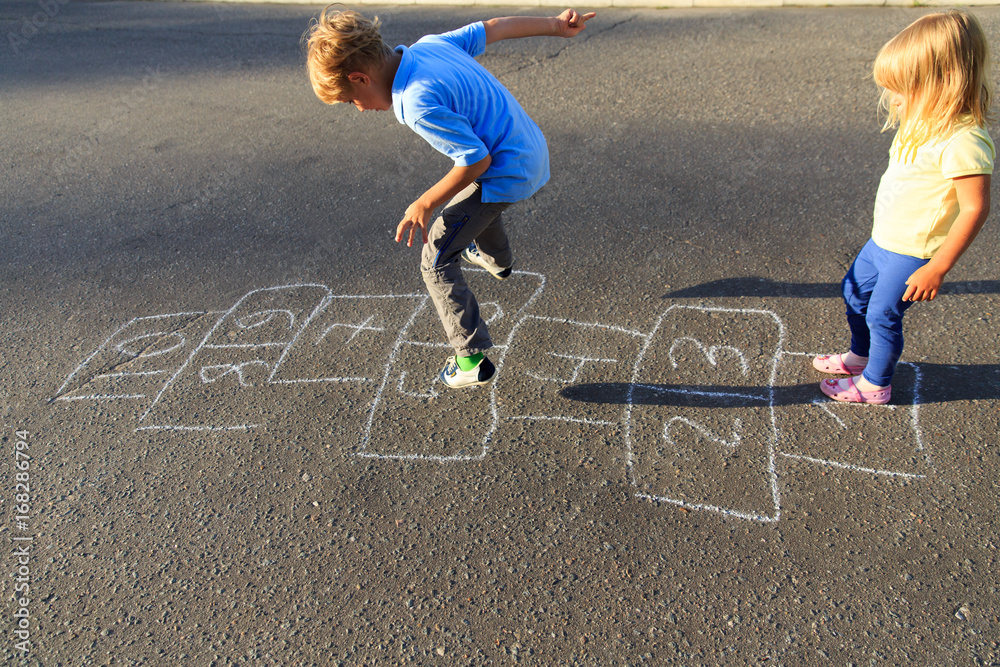 kids playing hopscotch on playground Stock Photo | Adobe Stock