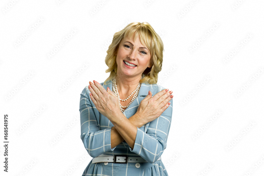 Older woman crossed arms on chest. Middle aged elegant woman smiling ...