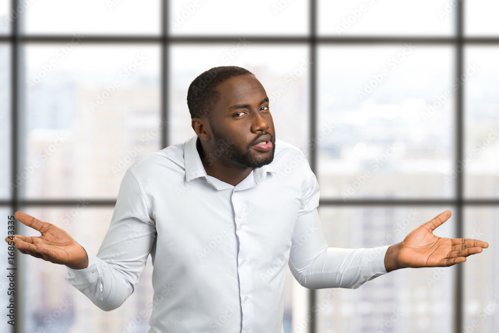 Black man with hands in different sides. Man with hands raised to the ...