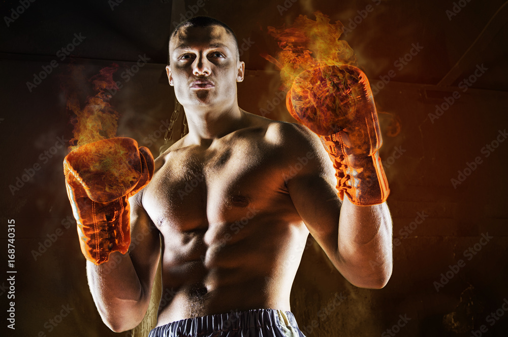 Conceptual Portrait of brutal boxer in fire sparks and smoke. Stock ...