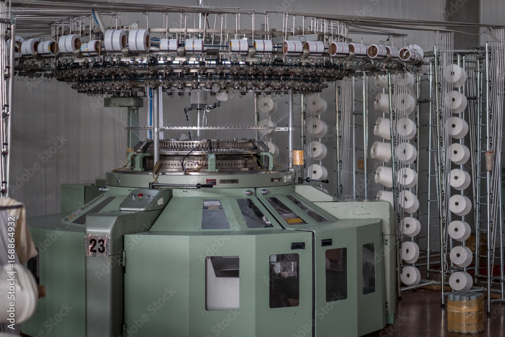 circular knitting machine Stock Photo | Adobe Stock